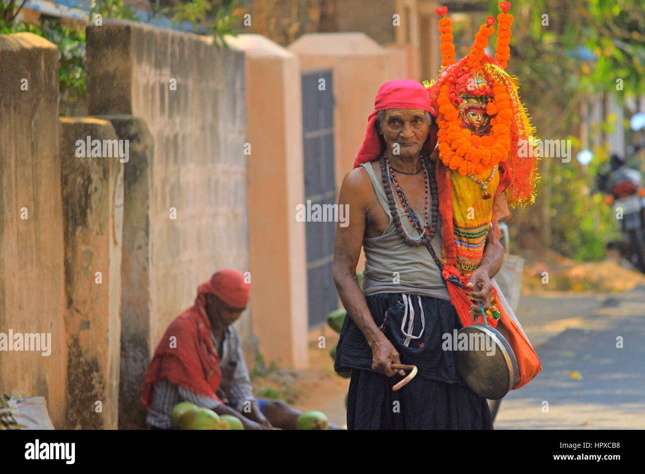 street portrait of mangala maa ( indian goddess) on the shoulder of ...