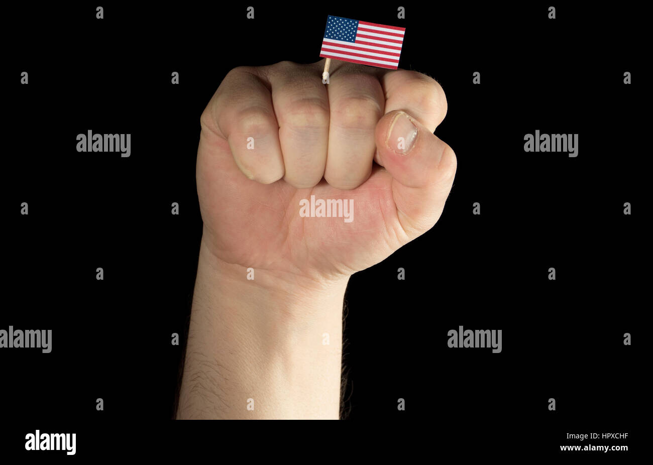 Man hand fist with United States flag isolated on black background ...