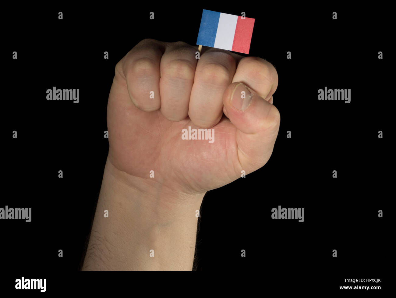 Man hand fist with French flag isolated on black background Stock Photo ...