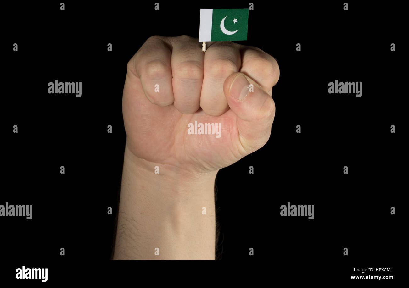 Man hand fist with Pakistani flag isolated on black background Stock ...