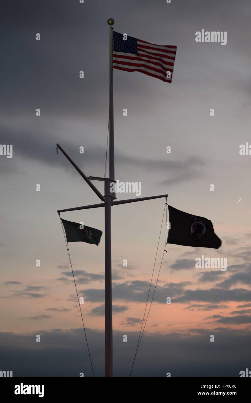 Flags at sunset Stock Photo - Alamy