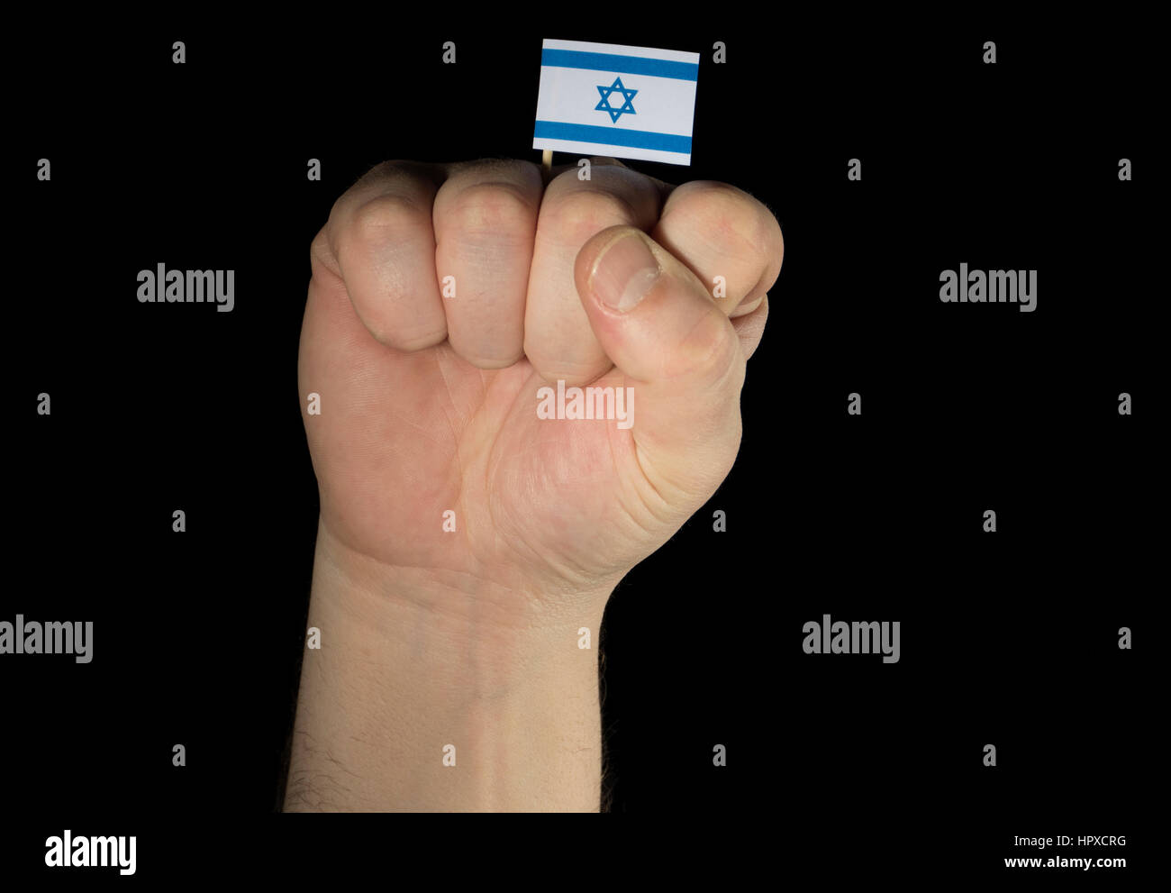 Man hand fist with Israeli flag isolated on black background Stock ...