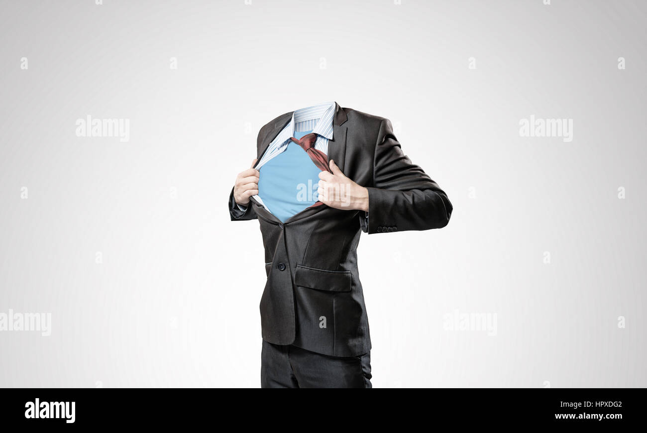 Headless businessman in black suit acting like super hero Stock Photo ...