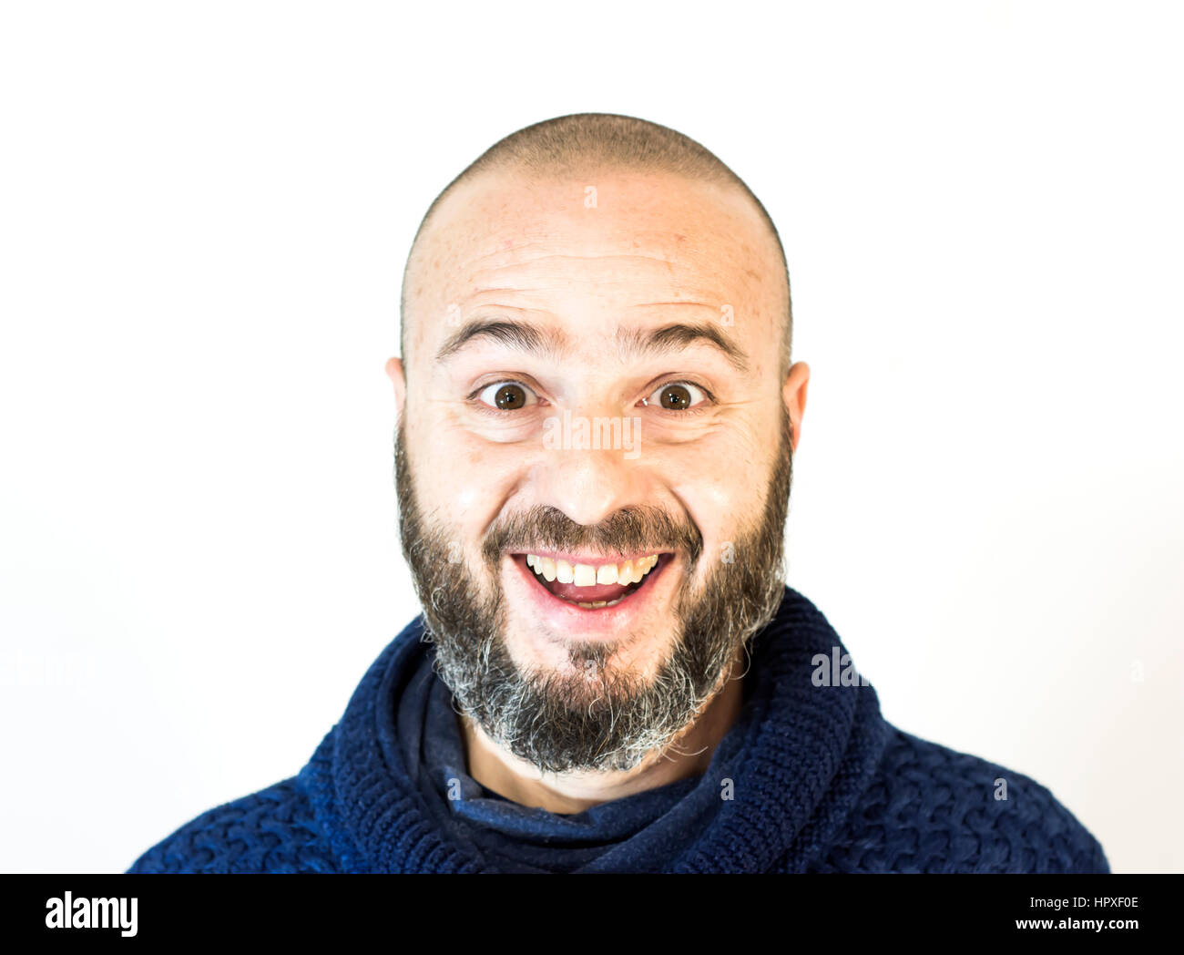 Handsome, bald man with beard on white background Stock Photo - Alamy