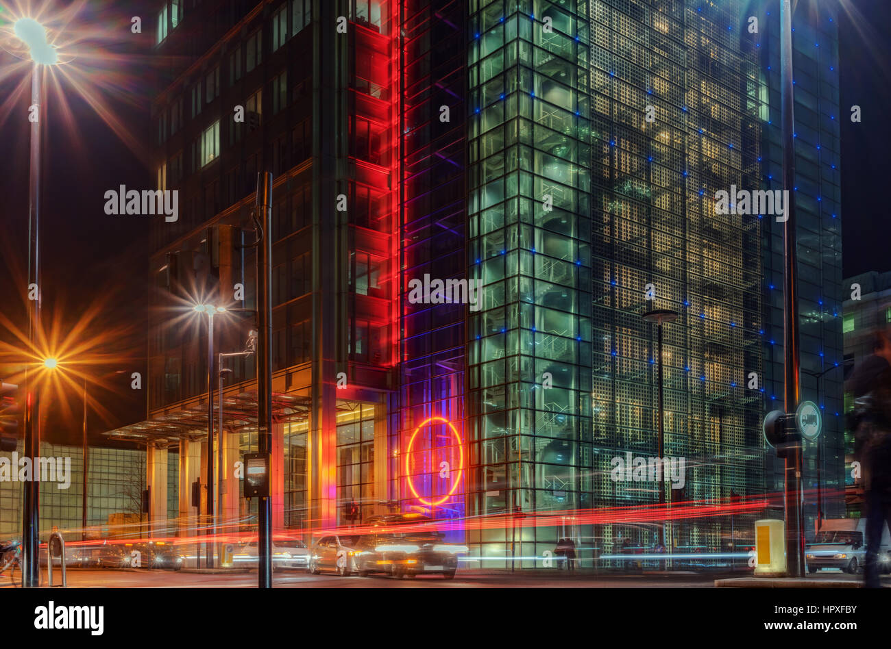 Traffic passing through a downtown city street Stock Photo - Alamy