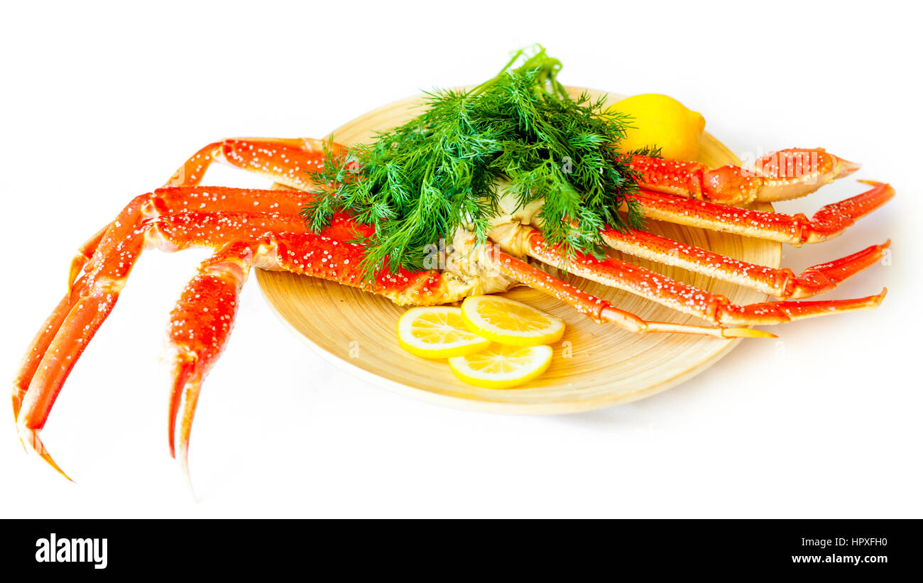 crab legs with lemon on a plate. Steamed crab Stock Photo - Alamy