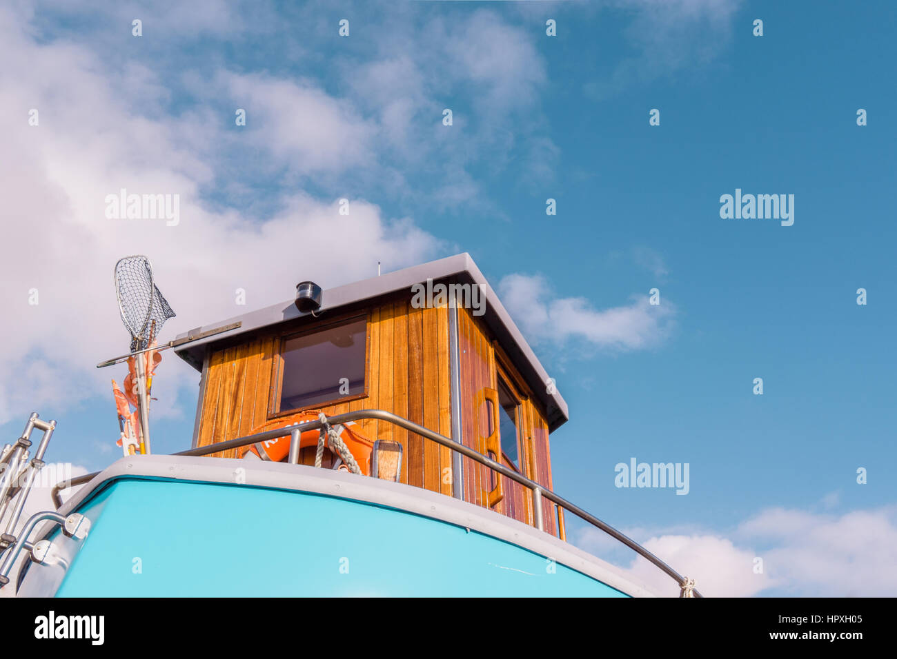 Trawler with cabin against blue sky, Denmark, February 22, 2017 Stock ...