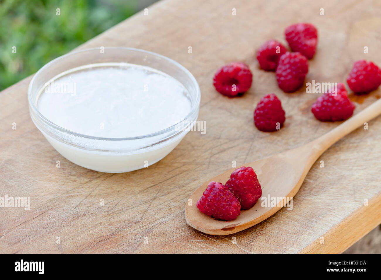 Yogurt and raspberries Stock Photo - Alamy