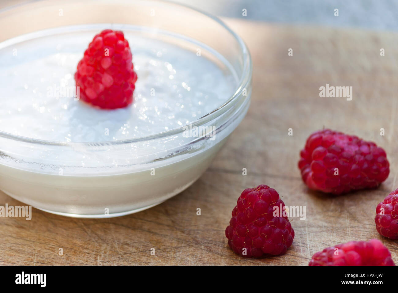 Yogurt with raspberries Stock Photo - Alamy