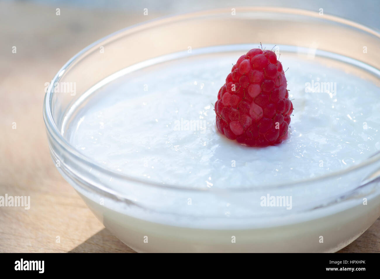 Yogurt with raspberry Stock Photo - Alamy
