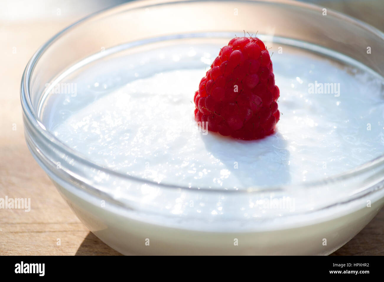 Yogurt with raspberry Stock Photo - Alamy