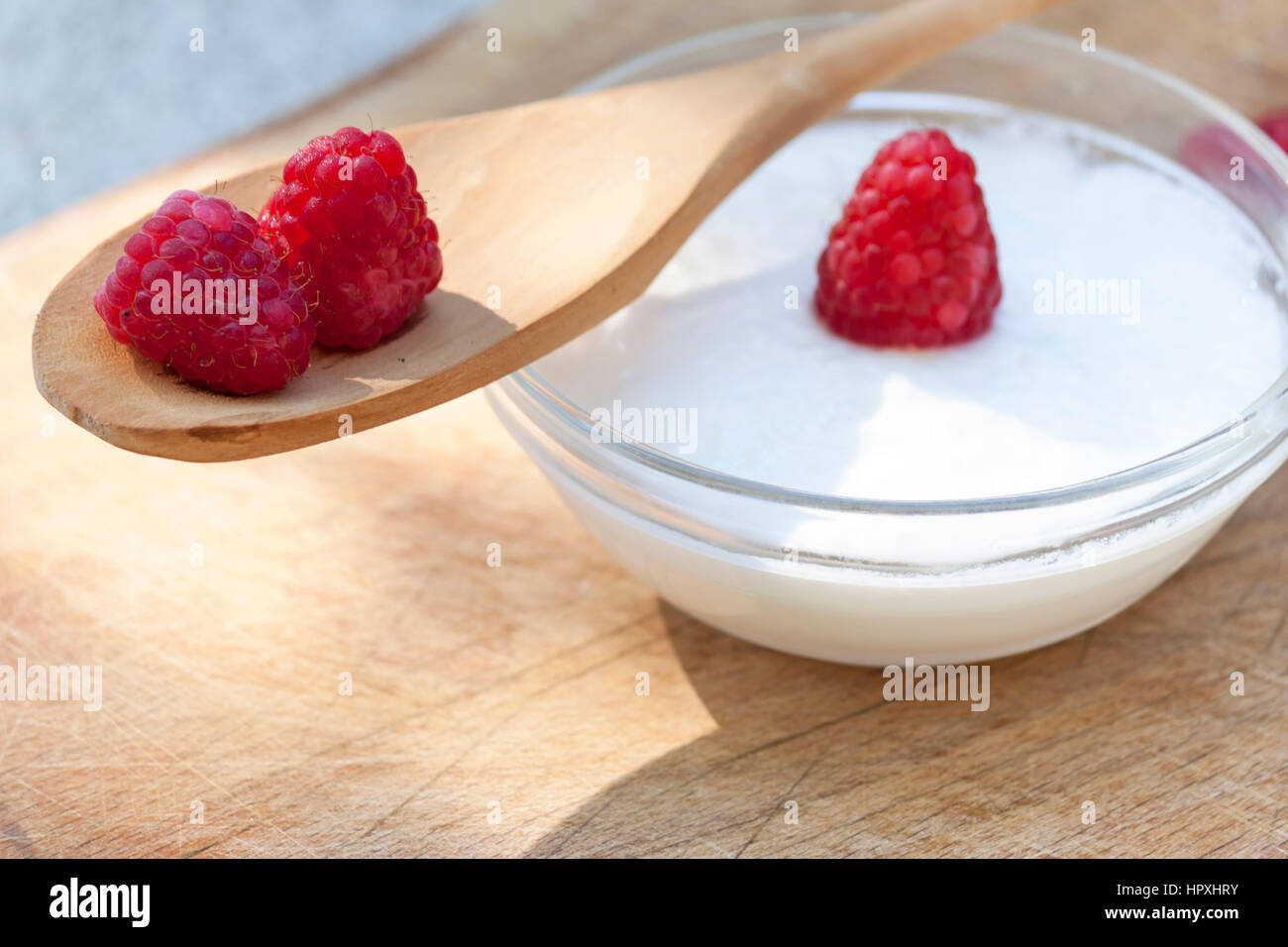 Yogurt with raspberry Stock Photo - Alamy
