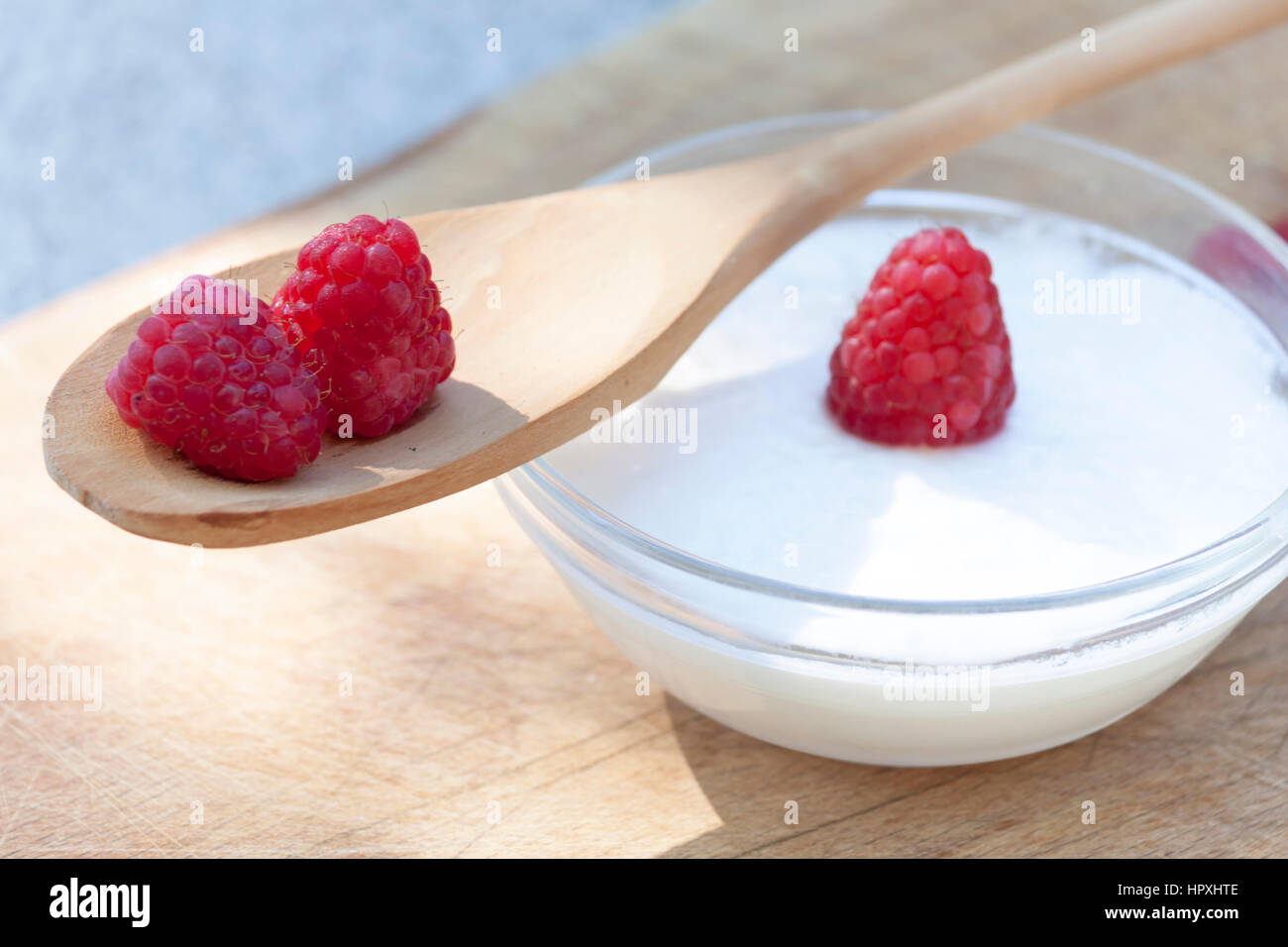 Yogurt with raspberries Stock Photo - Alamy