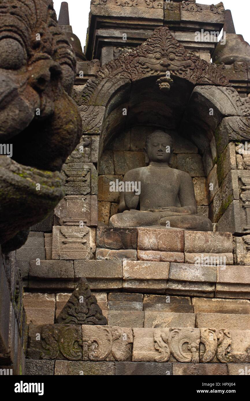 Buddha statue in stupa, Borobudur, near Yogyakarta, Java, Indonesia ...