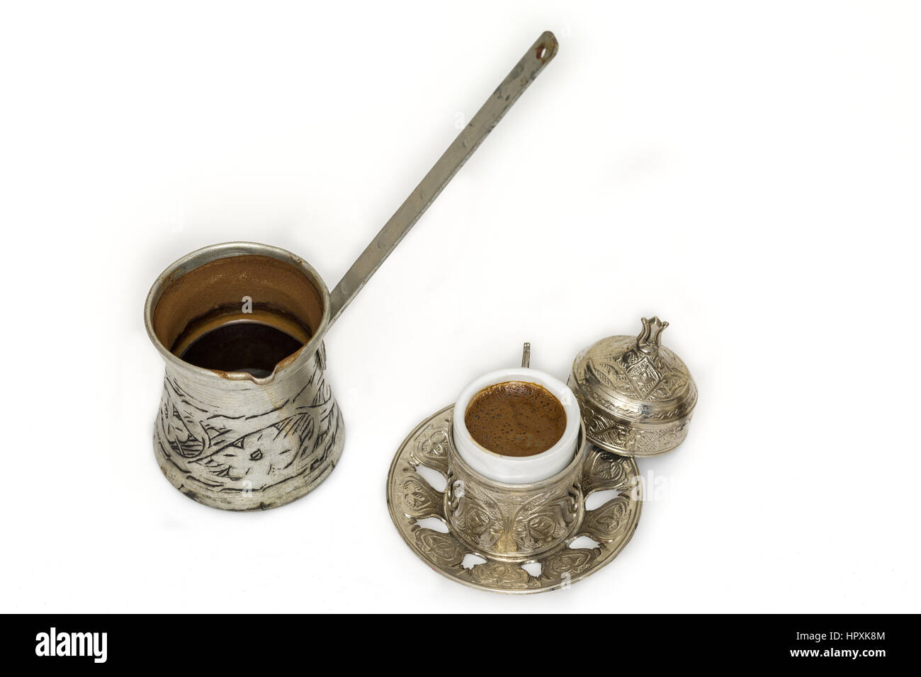 Turkish coffee and coffee pot on white background Stock Photo - Alamy