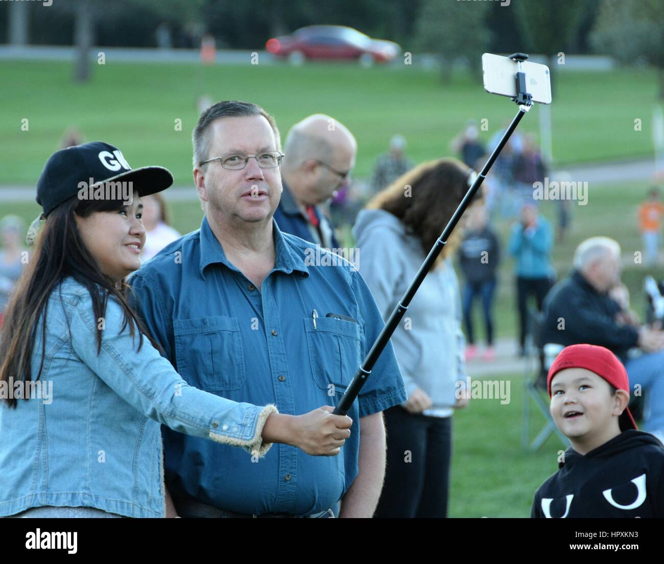 Unidentified people taking a Selfie picture Stock Photo - Alamy