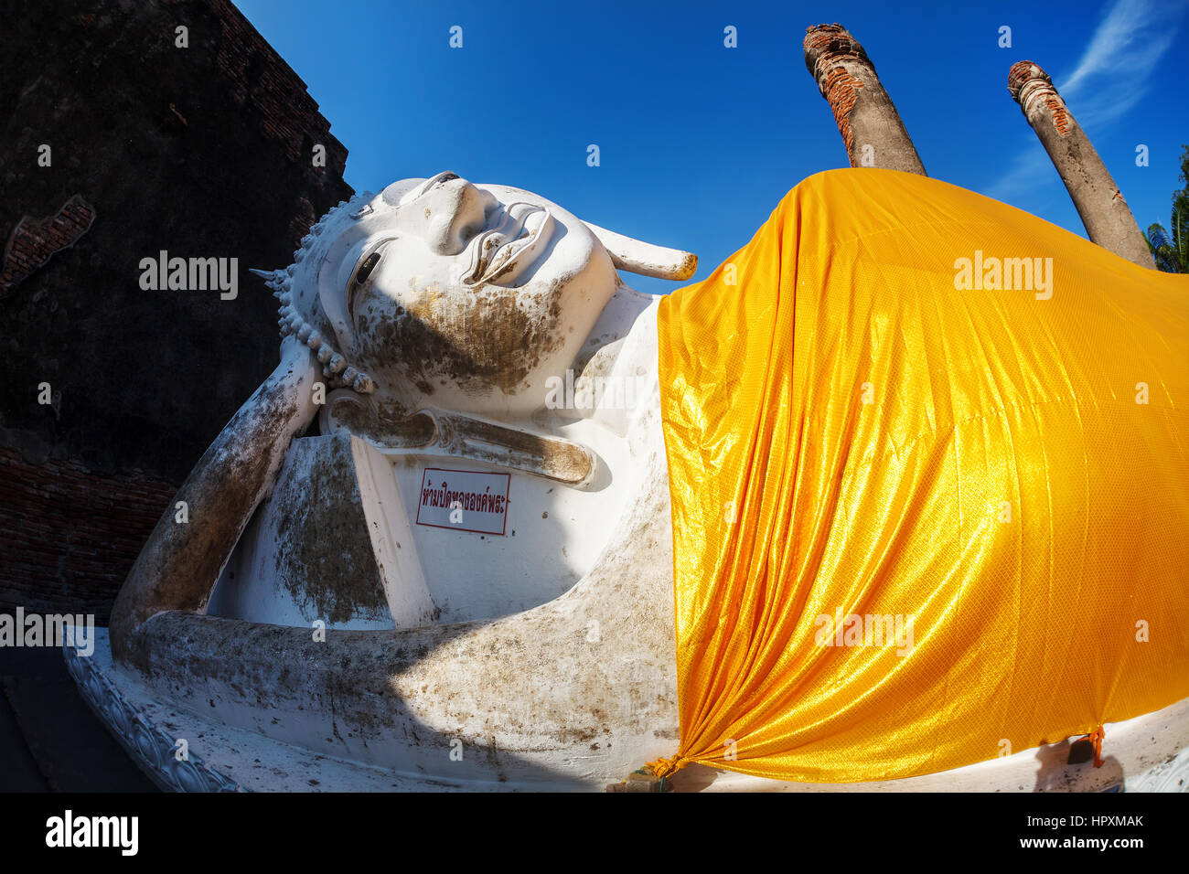 Big Lying Buddha statue with yellow robe in Wat Yai Chai Mongkol ...