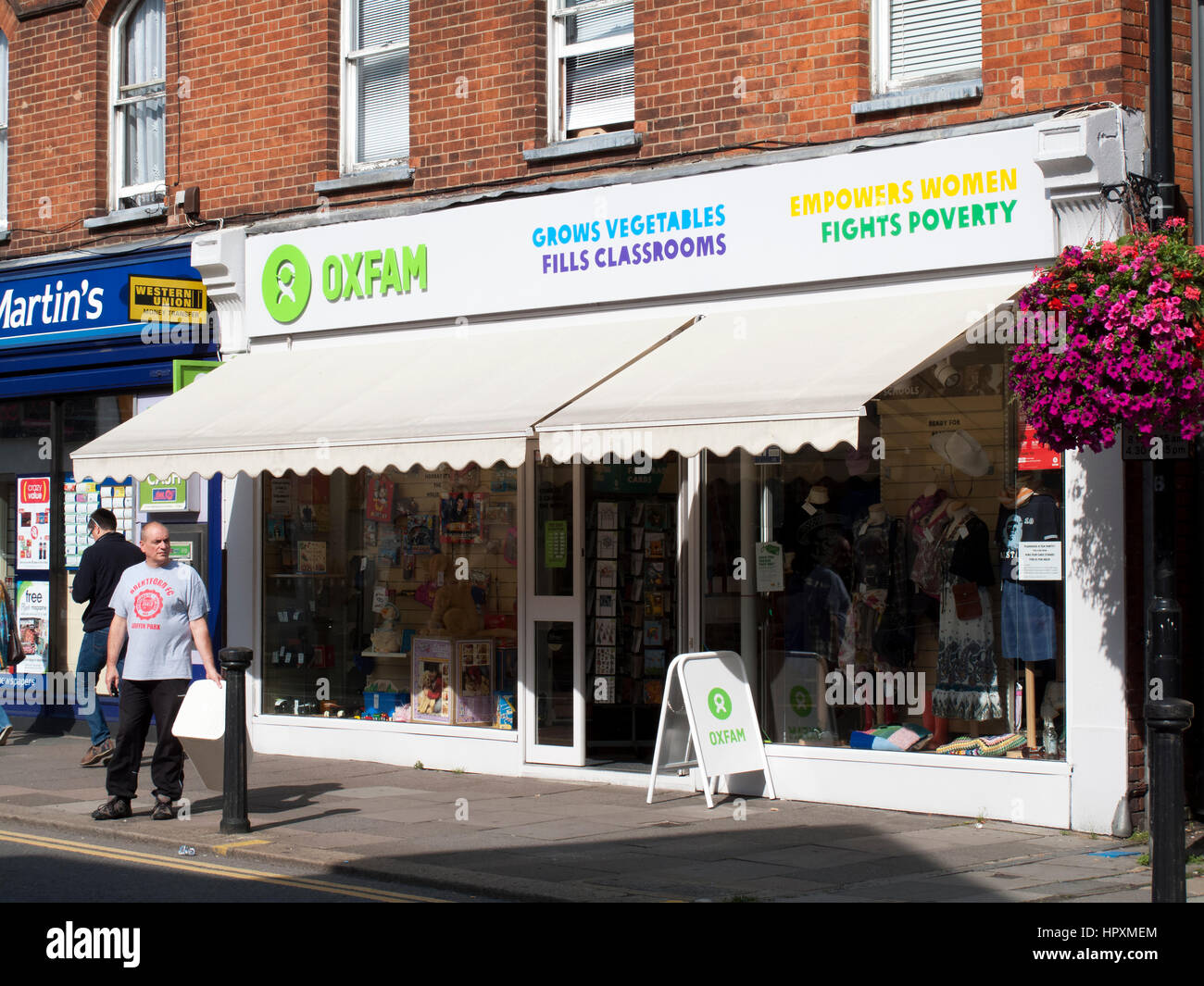 Oxfam charity shop, organisation fighting poverty and injustice around ...