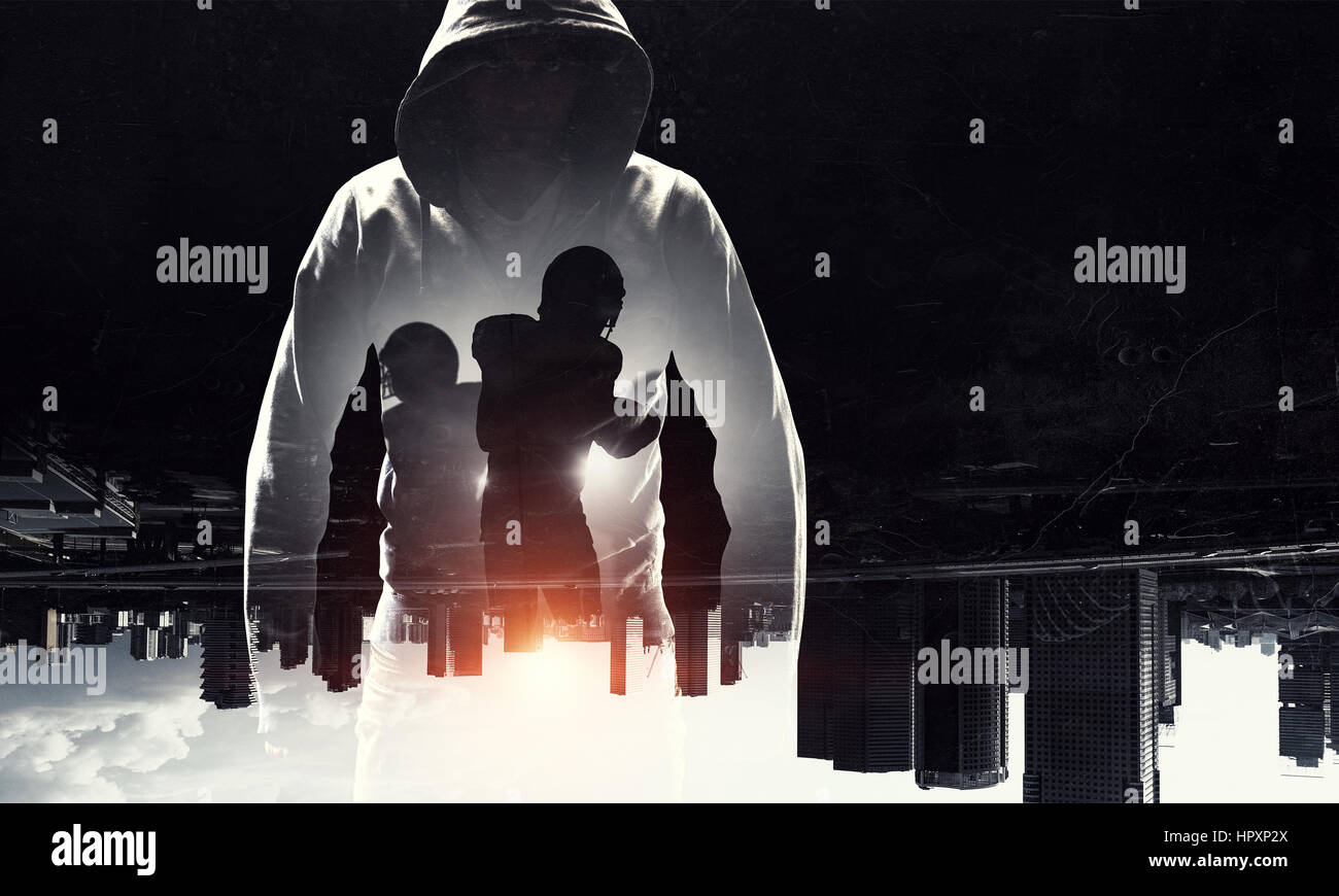 Double exposure of american football players fighting for ball Stock ...