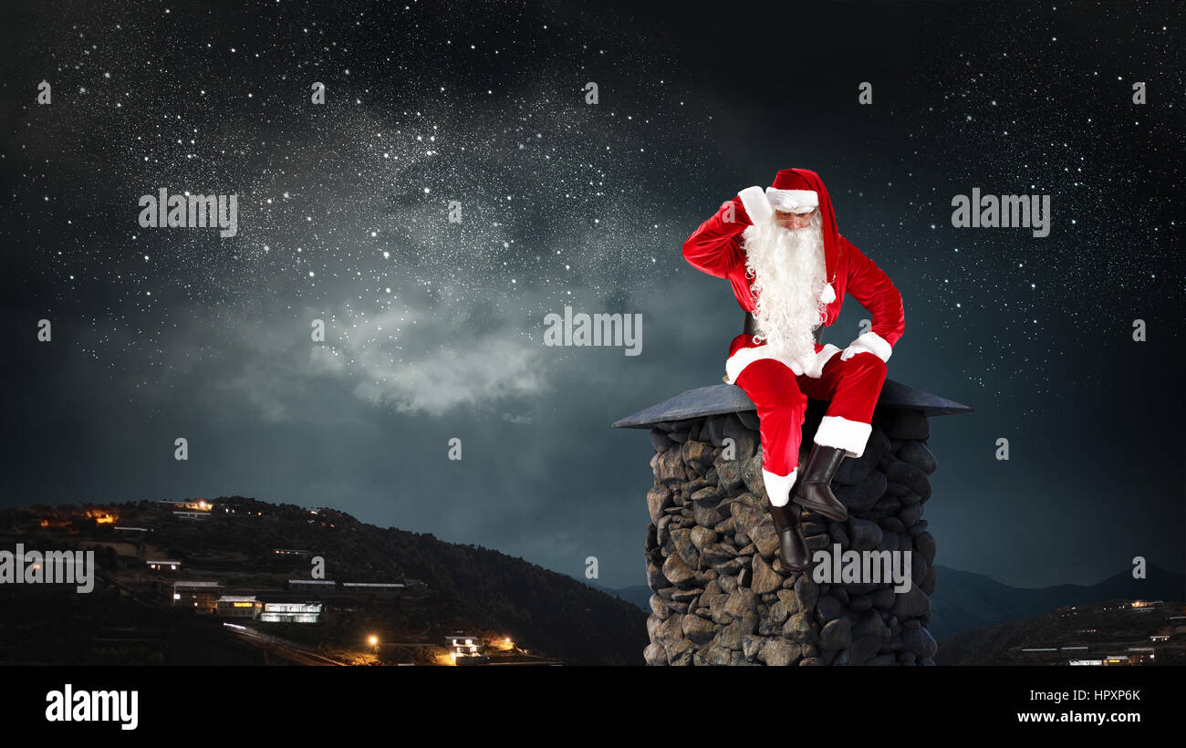 Santa claus stuck in chimney hi-res stock photography and images - Alamy
