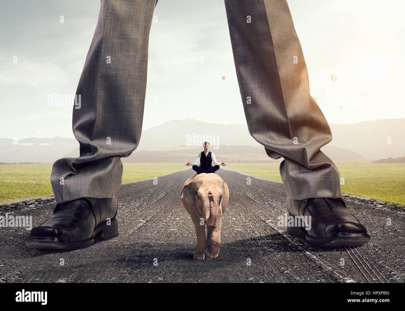 Bottom view of giant businessman as concept of power and leadership ...