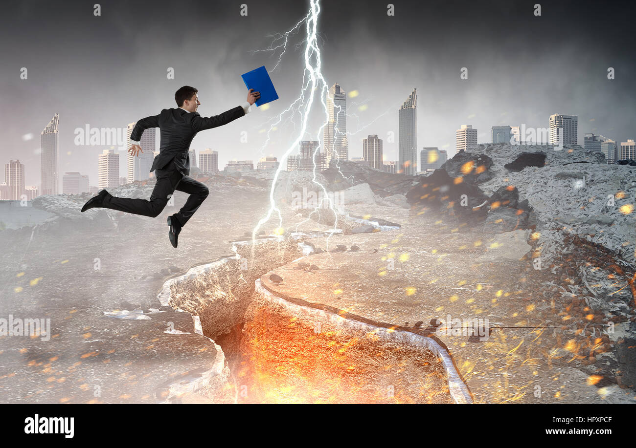 Concept of failure and trouble with businessman jumping over crack in ...