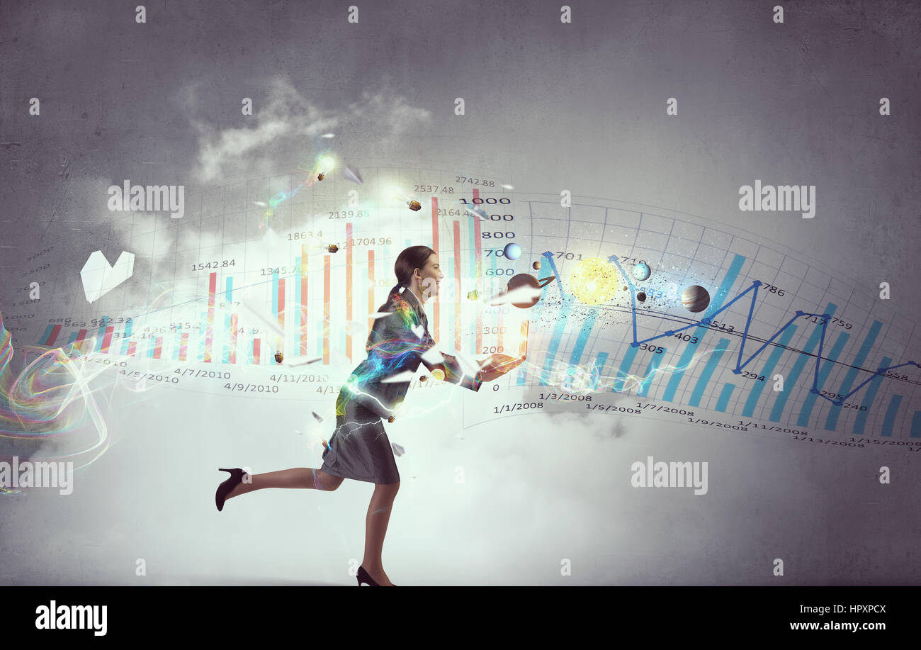 Successful businesswoman running with laptop computer in hands Stock ...