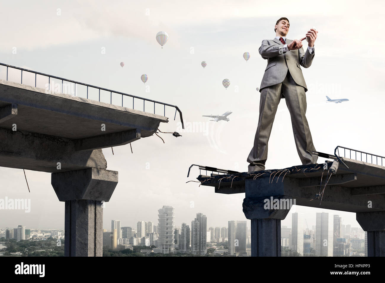Giant businessman with long legs looking away. Mixed media Stock Photo ...