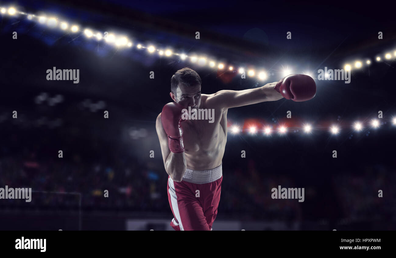 Professional box fighter on grand arena. Mixed media Stock Photo - Alamy