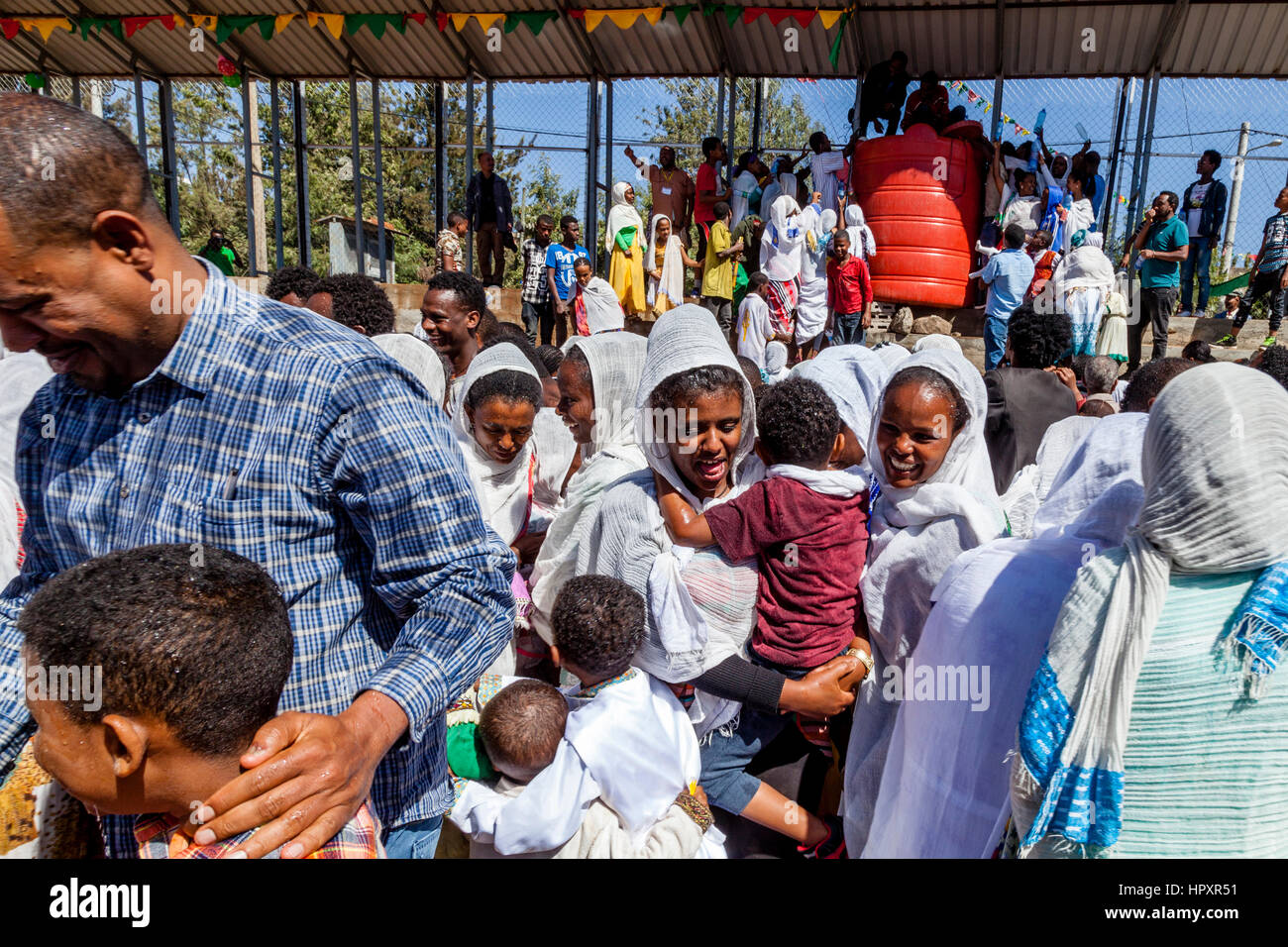 Holy Water Is Thrown Over Ethiopian Christians During The Timkat ...