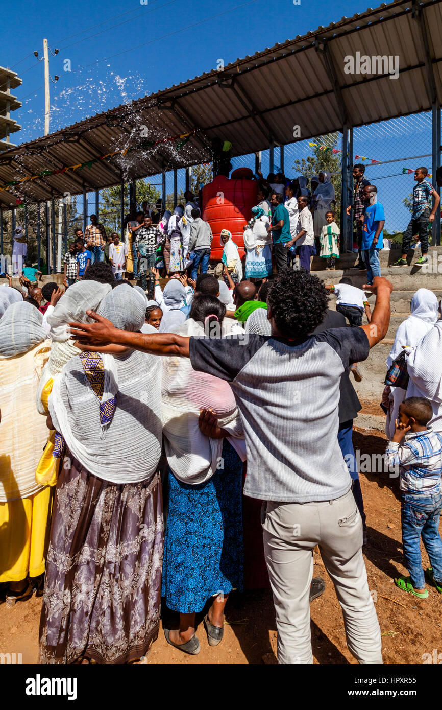 Holy Water Is Thrown Over Ethiopian Christians During The Timkat ...