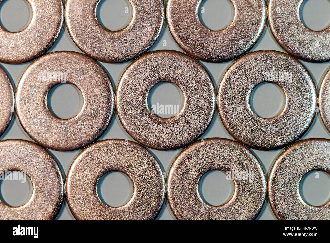 Joiner's accessories. Stacks of metal screw washers isolated on white ...