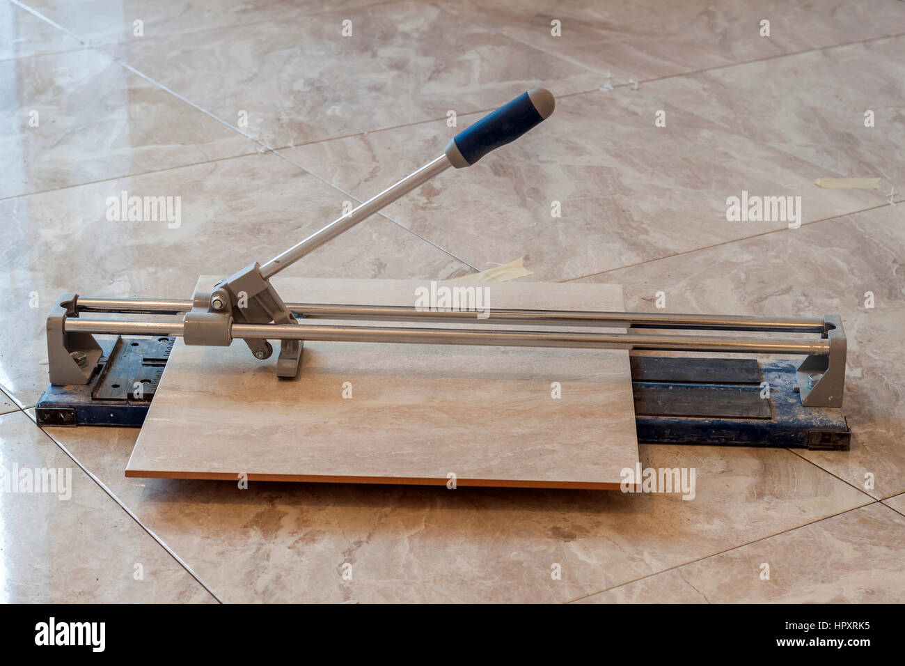 Ceramic tiles and tools for tiler. Floor tiles installation. Home ...