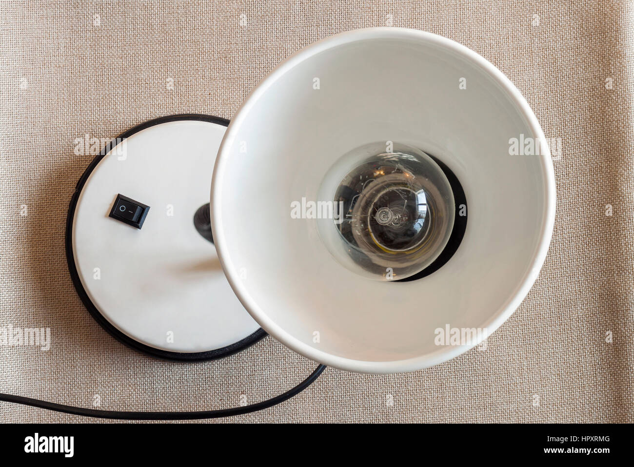 White table lamp looking up on cloth background Stock Photo - Alamy