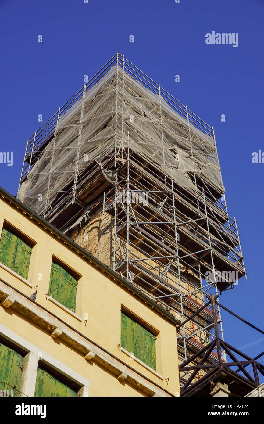 Extensive scaffolding providing platforms for work in progress Stock ...