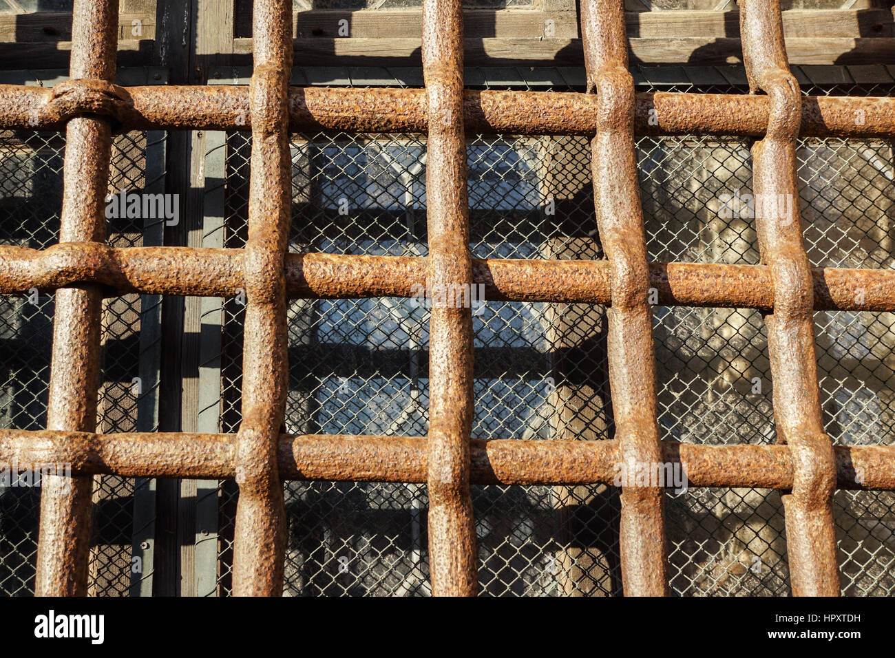 Close up iron bars or metal grating on window or prison cell Stock ...
