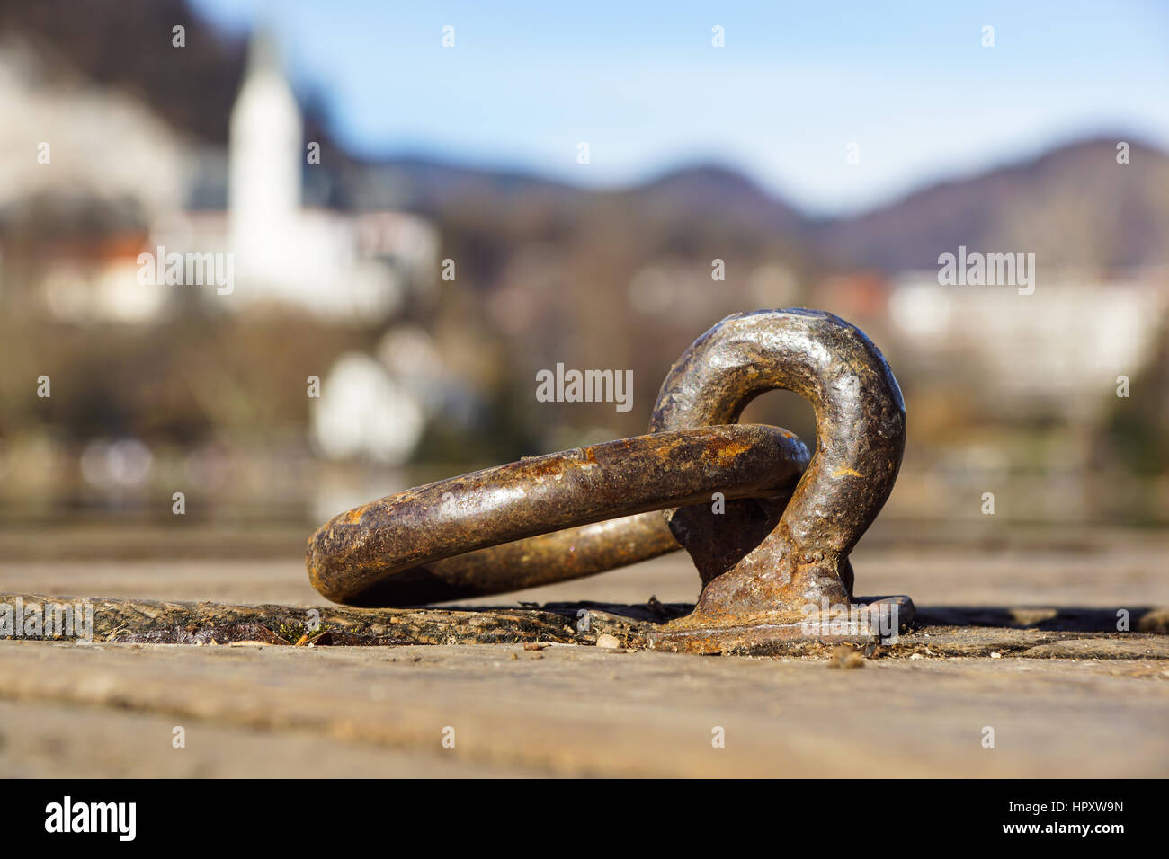 Large metal hooks on quay for mooring boats Stock Photo - Alamy