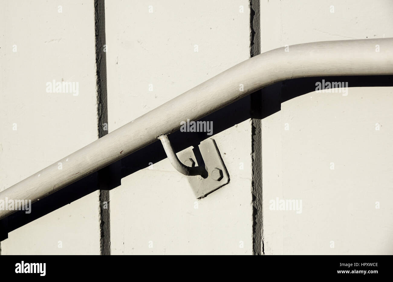 Holder handrail railing stainless steel Close up detail Stock Photo - Alamy