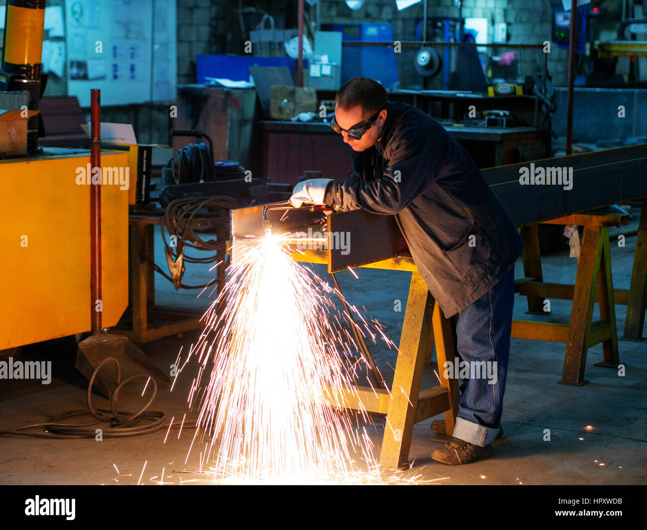 Welder working with metal at factory. Horizontal Stock Photo - Alamy