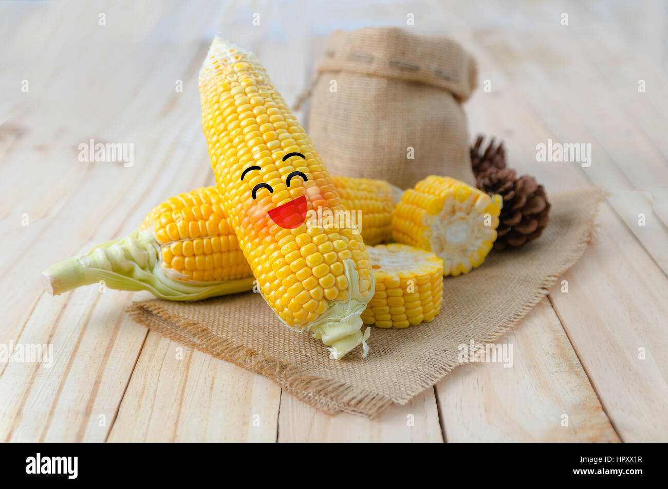 Close up shot Happy fresh and nature corn with smile face shallow depth ...