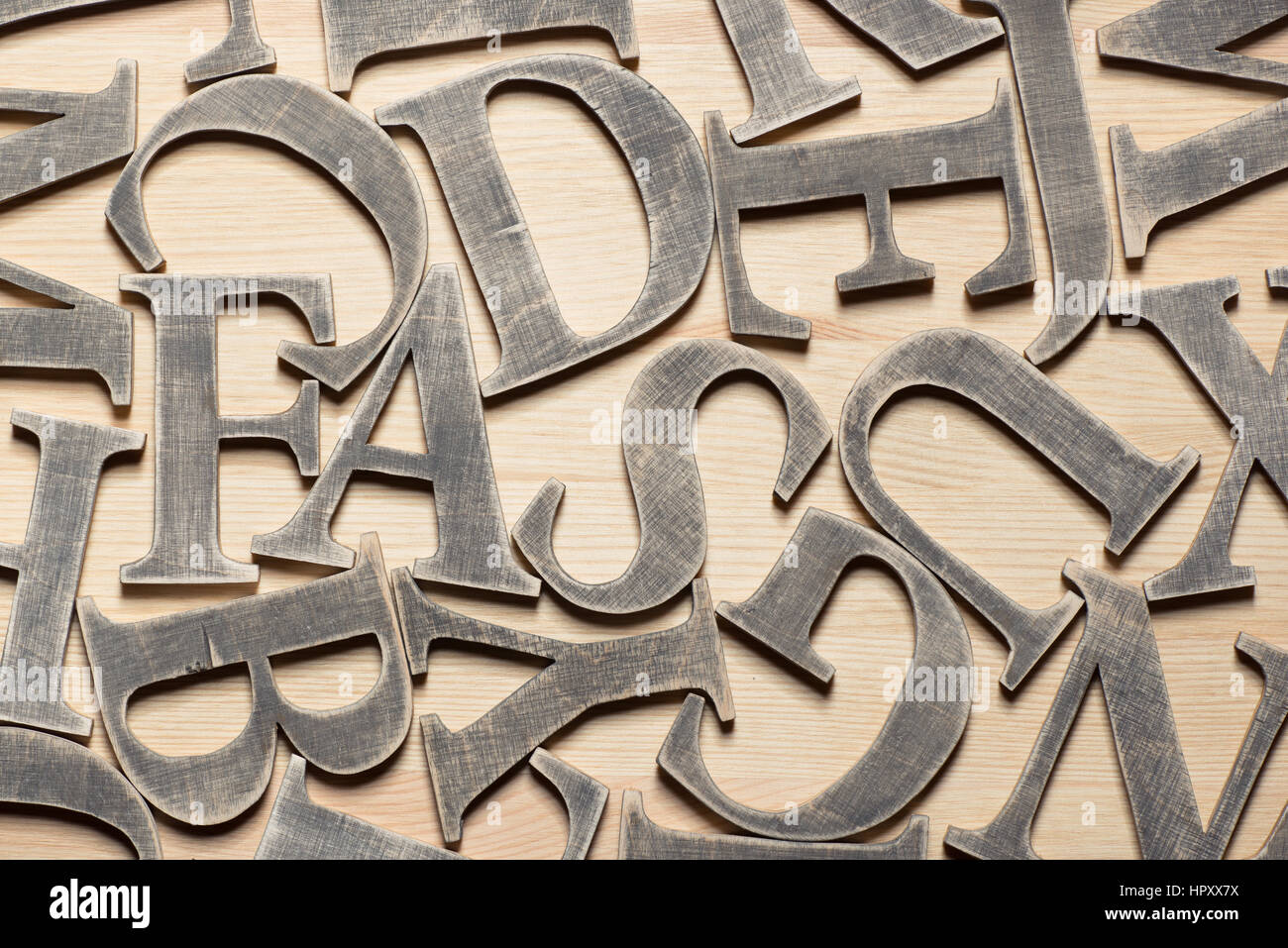 Wooden letters on wooden background Stock Photo - Alamy