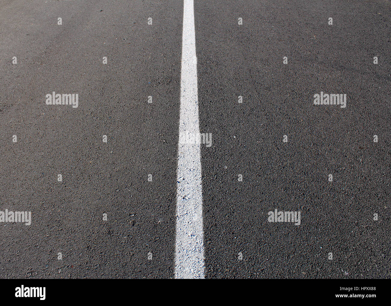 White line on a road Stock Photo - Alamy