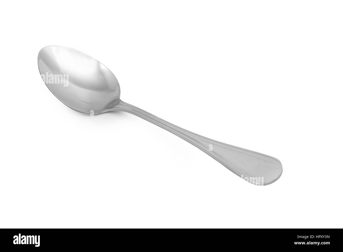 Stainless steel glossy metal kitchen spoon isolated over the white ...