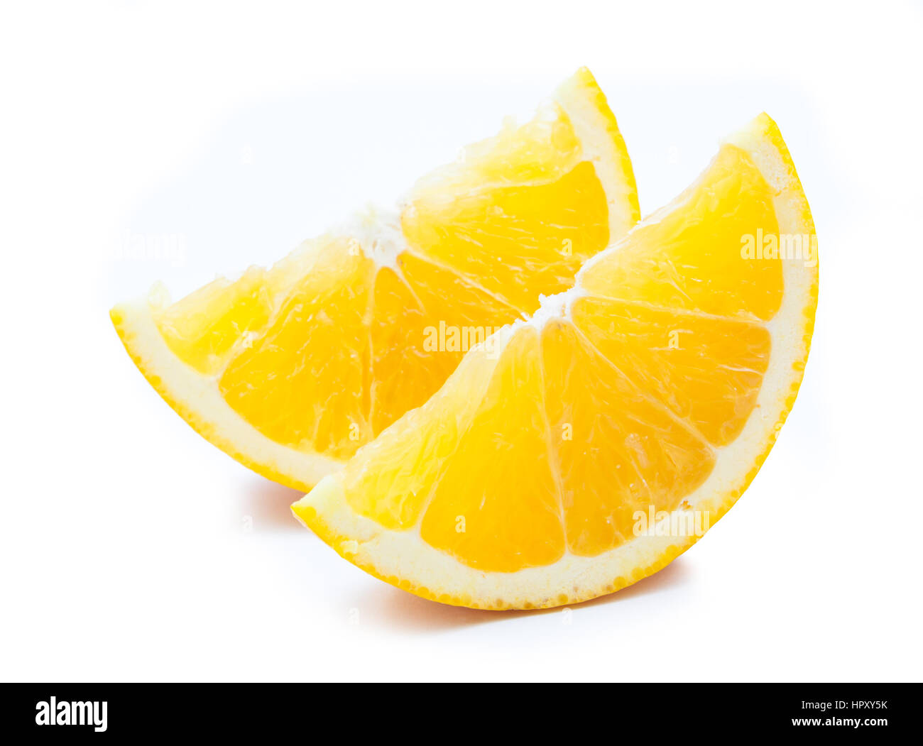 two slices of orange isolated on white background Stock Photo - Alamy
