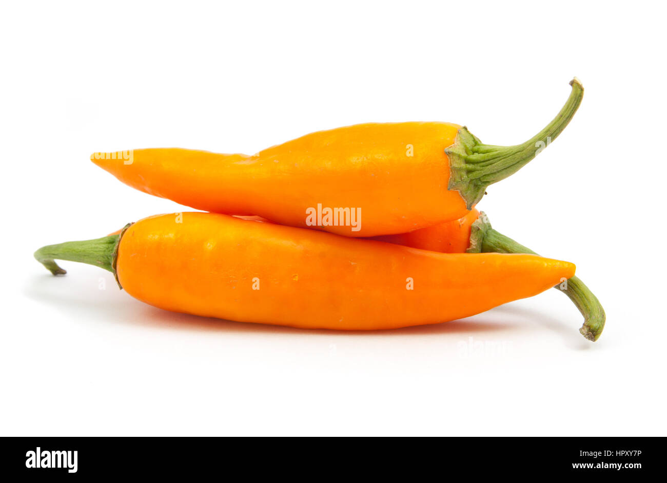 orange hot chili pepper isolated on a white background Stock Photo - Alamy