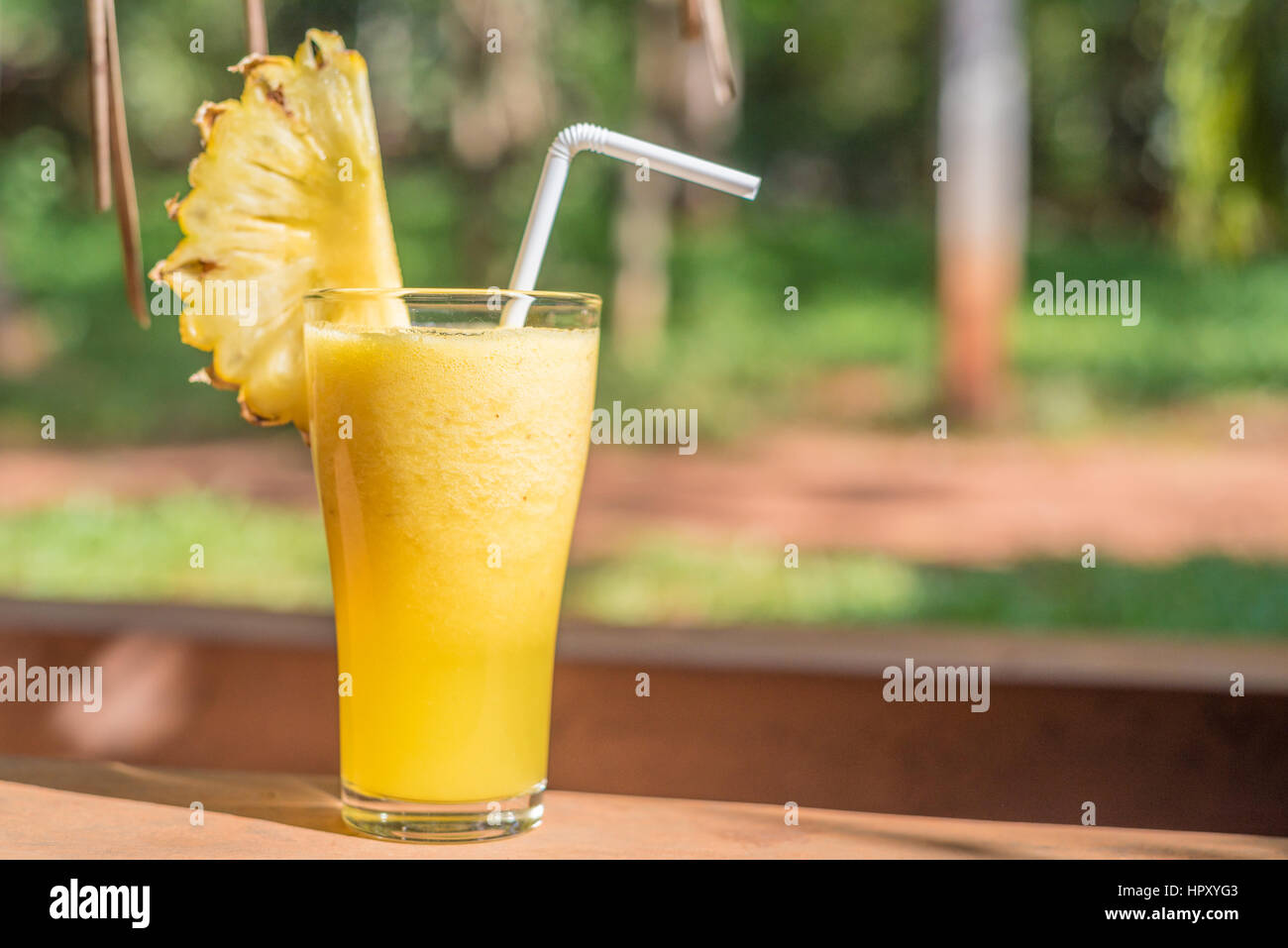 Fresh tropical pineapple juice during tropical vacation Stock Photo - Alamy