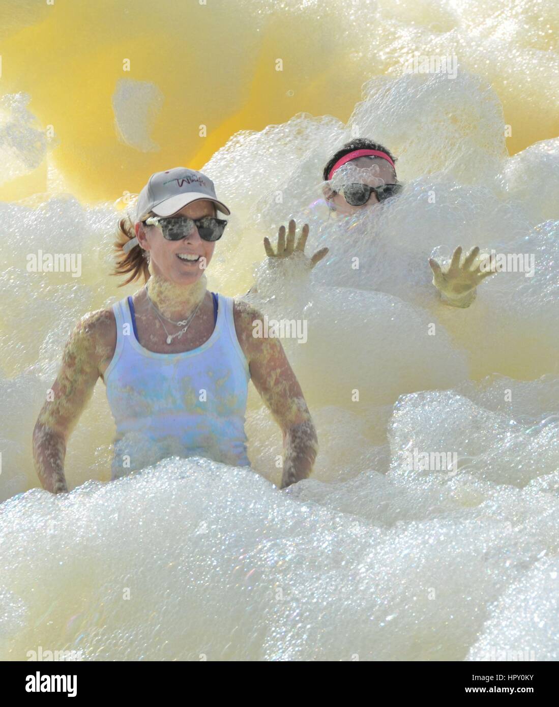 Bubble Run Fundraiser Stock Photo - Alamy