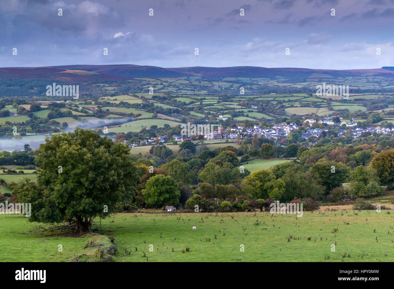 Moretonhampstead town and church at dawn on a misty morning, Dartmoor ...