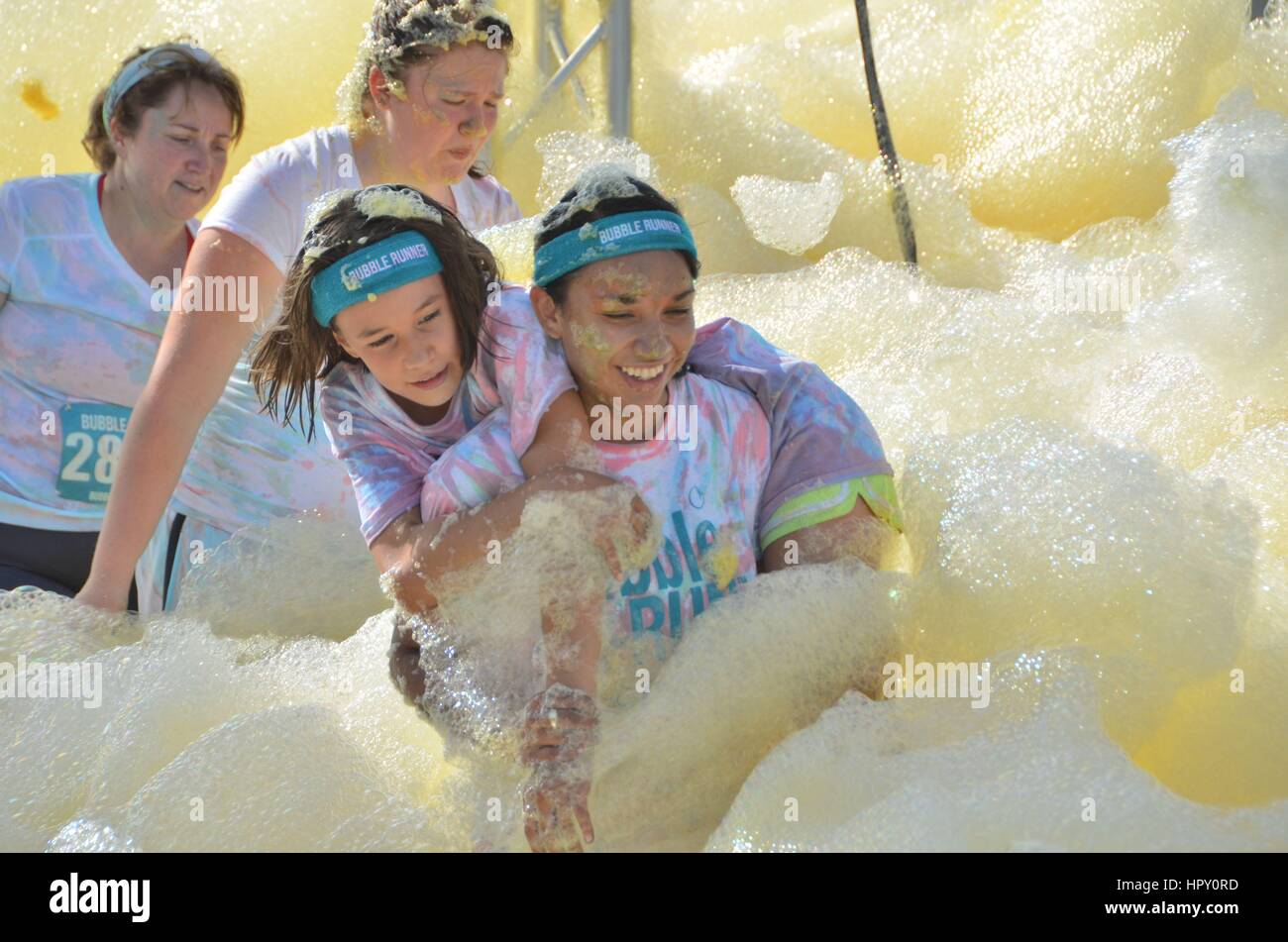 Bubble Run Fundraiser Stock Photo - Alamy