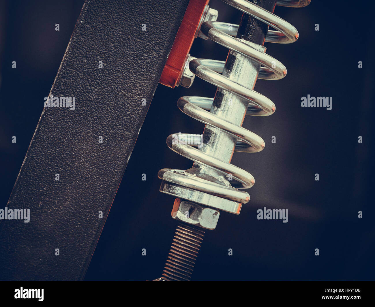 Pump, device, detail closeup concept. Big, hard made of steel spring on ...